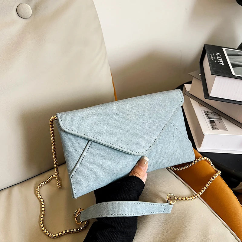 Chic Denim Envelope Clutch With Gold Chain Strap on Luulla