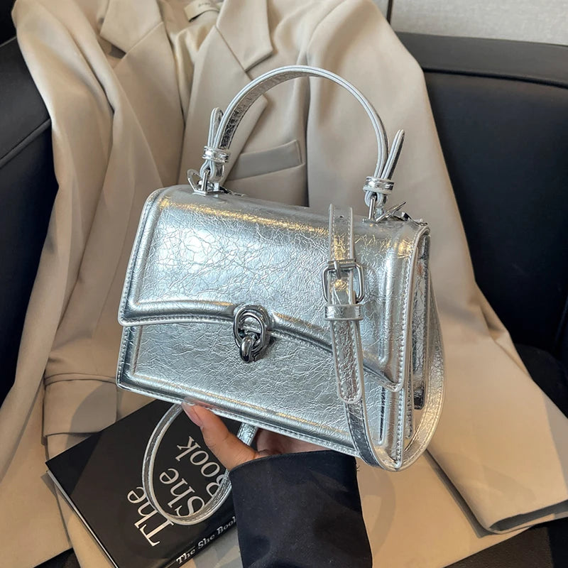 Elegant Silver Metallic Womens Handbag With Twist Lock on Luulla
